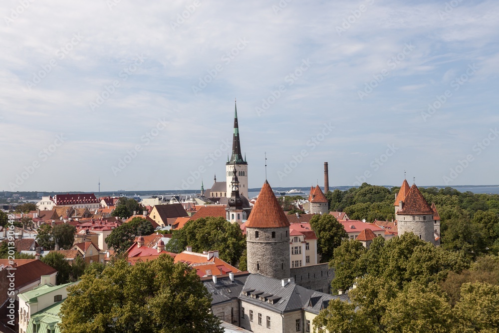Medieval town rooftop view. Tallinn churches and towers steeples ...