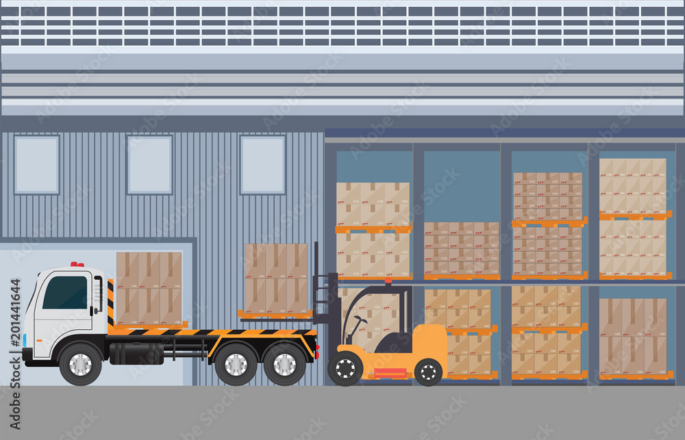 Workers man loading the truck with pallets of goods at the industrial ...