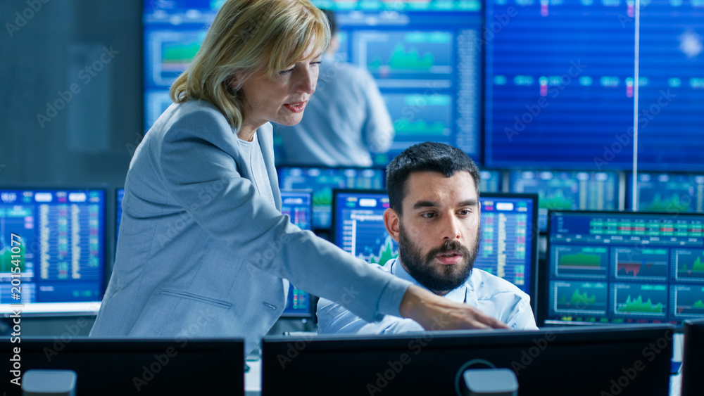 In the Stock Market Firm Head of the Department Helps Professional ...