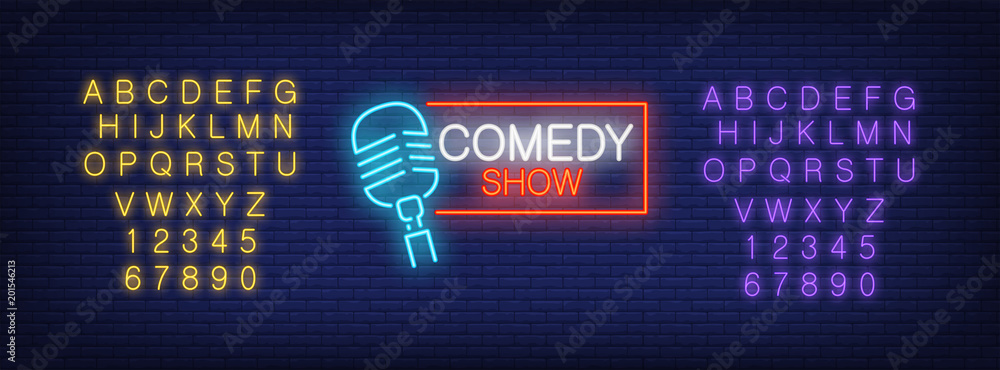 Neon alphabet and Comedy Show lettering with mike in frame on brick ...