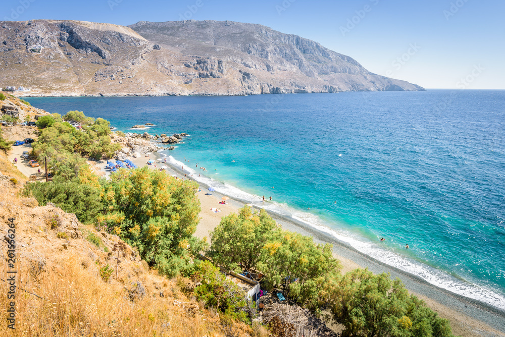 Beautiful sunny coast view to the greek blue sea with crystal clear ...