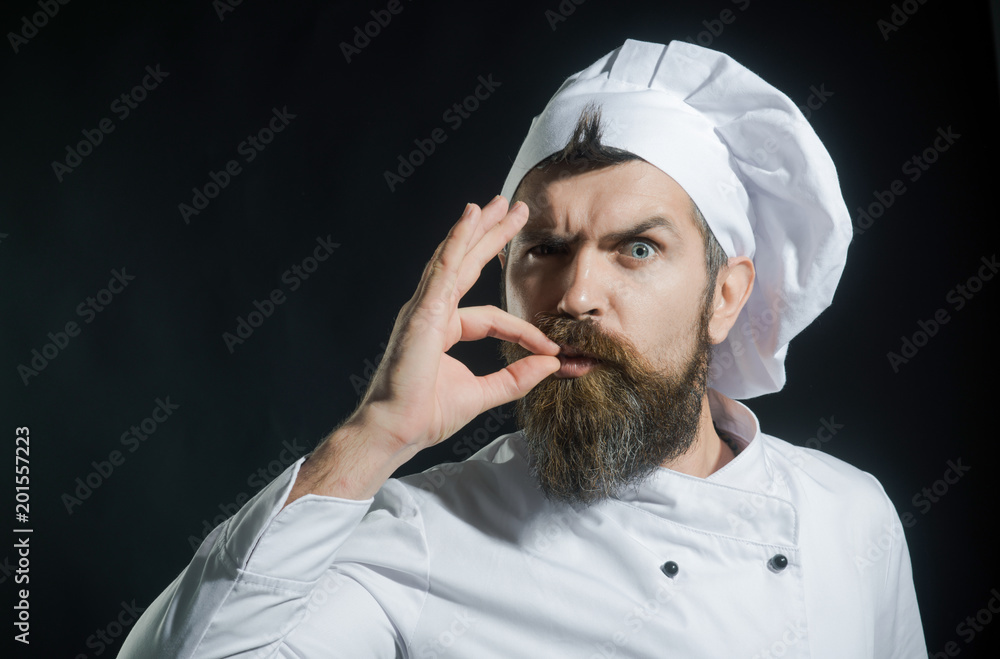 Chef, cook making tasty delicious gesture by kissing fingers. Confident ...