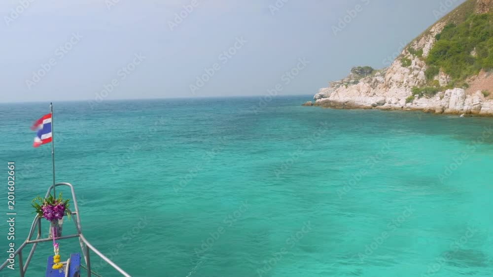 Viewi of cliffy shore of island Rin, Thailand. View from sailing boat ...