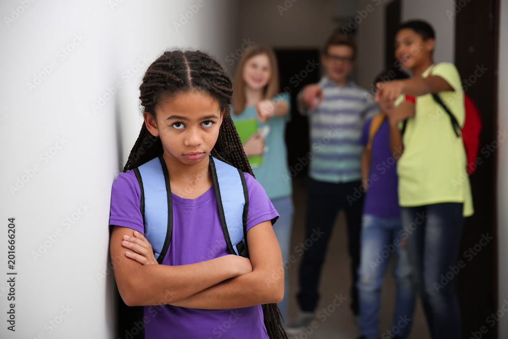 Sad African American girl indoors. Bullying in school Stock Photo ...