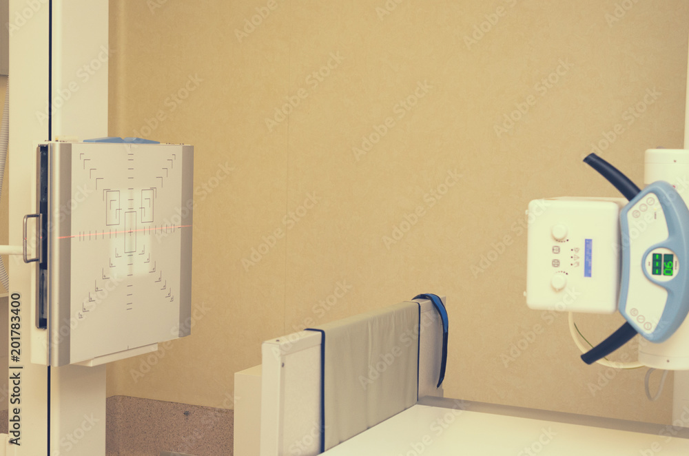 Room with an X-ray apparatus table for the production of X-ray images ...