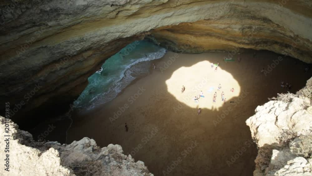 Benagil Cave seen from the top of rocky cliff in Algarve coast. Aerial ...