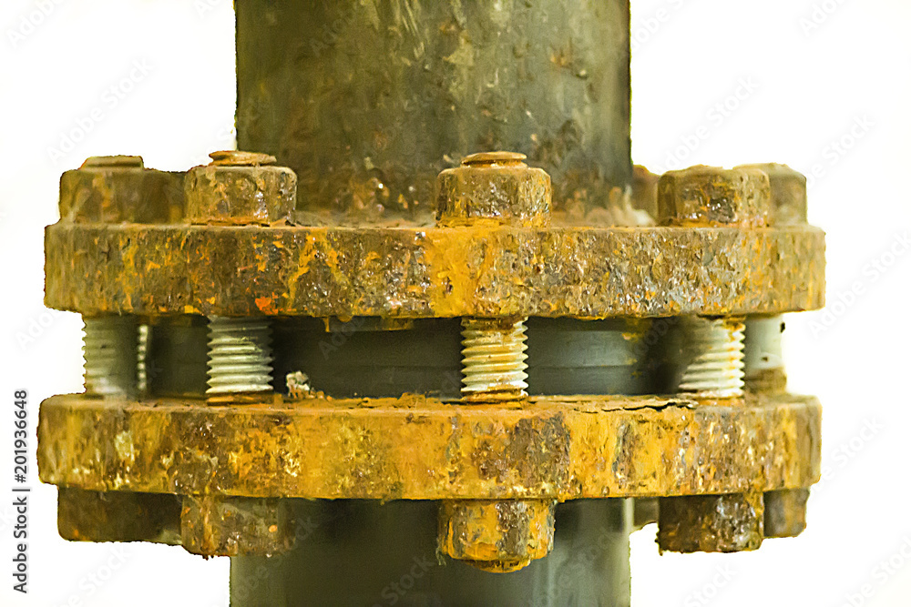 The flanges of valves with bolts and nuts corrosion isolated. foto de ...