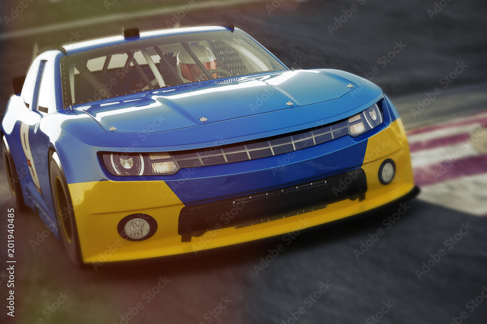 Motor sports race car front angled view speeding down the track ...