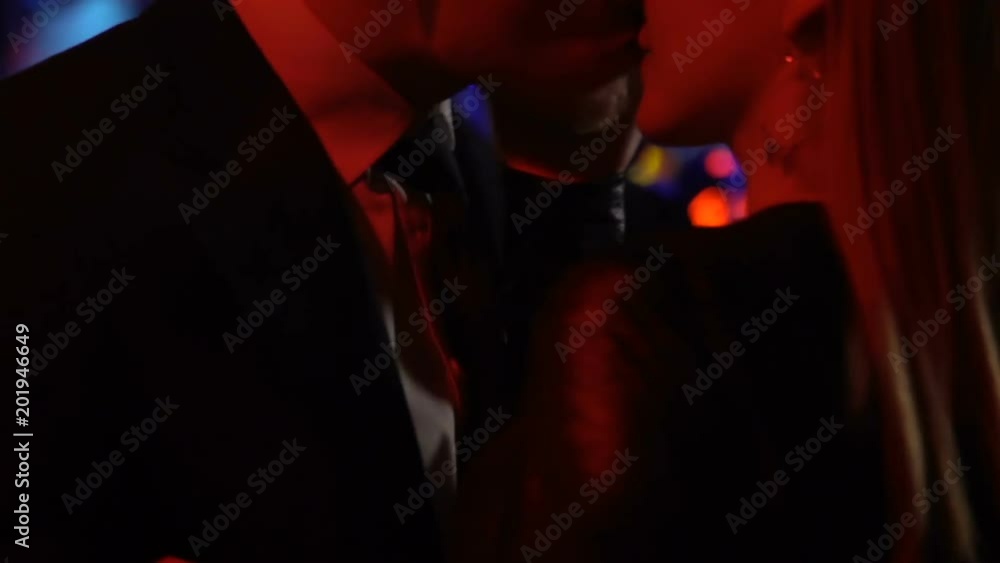 Night club couple passionately kissing on dance floor, one-night ...
