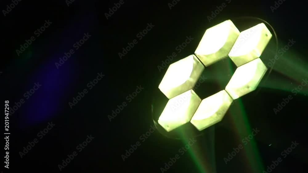 Rotating strobe light illuminating dance floor, night club equipment ...