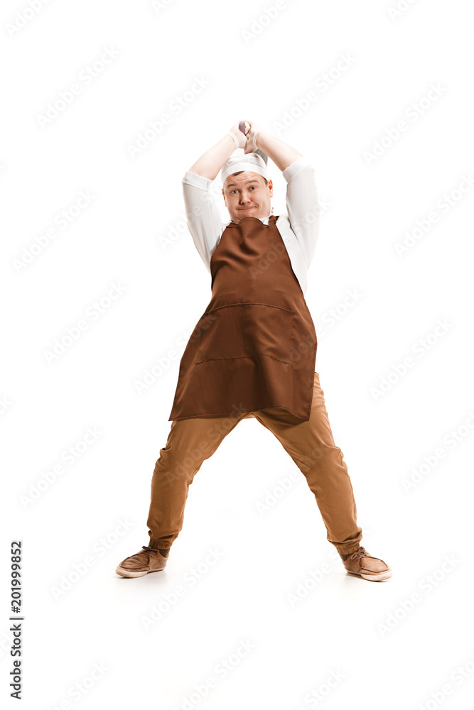 Angry aggressive butcher posing with a cleaver isolated on white ...