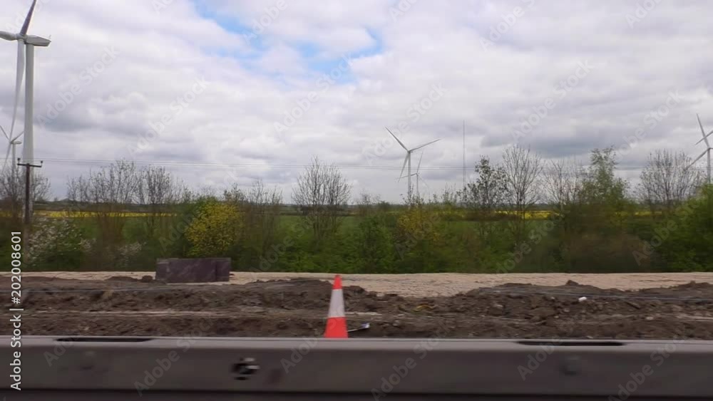 Car side view while driving showing roadworks or road construction and ...