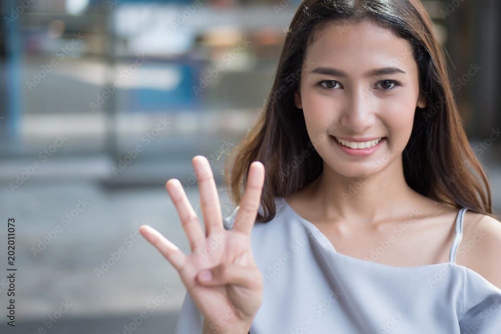 Holding Up 4 Fingers