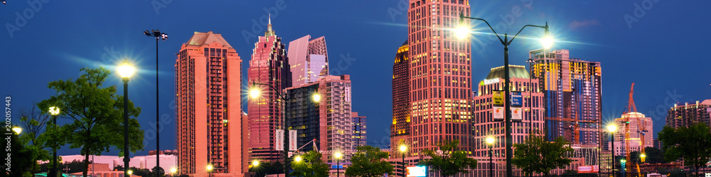 Illuminated Midtown in Atlanta, USA at night. Car traffic, illuminated ...
