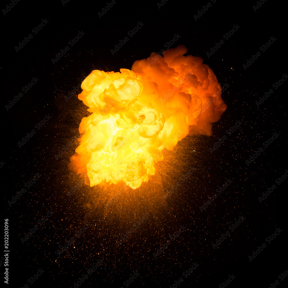 Realistic fiery explosion with sparks over a black background Stock ...