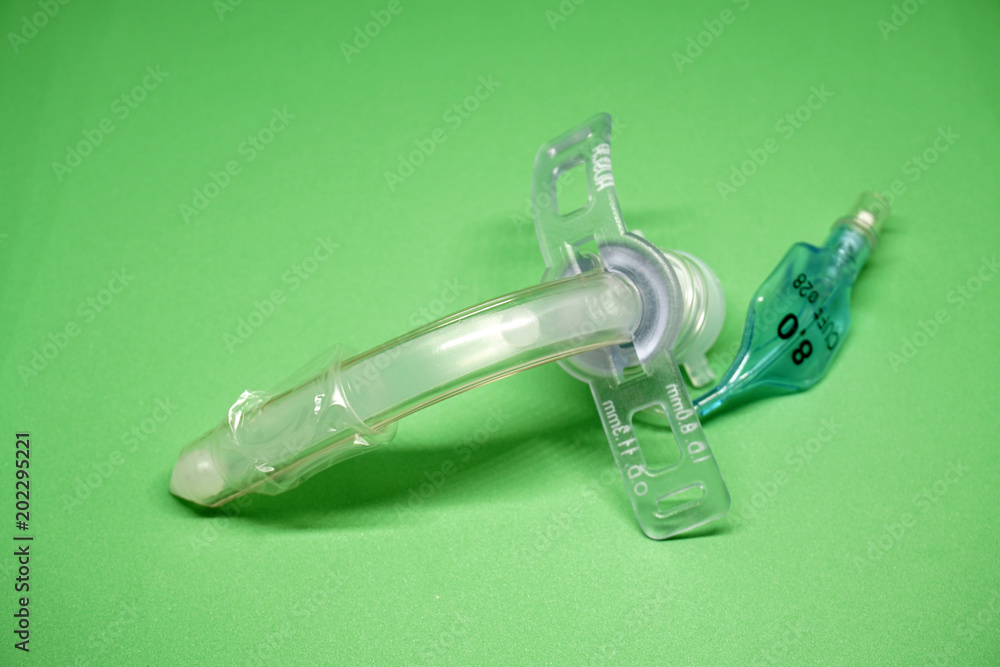 tracheostomy tube on a green background Stock Photo | Adobe Stock