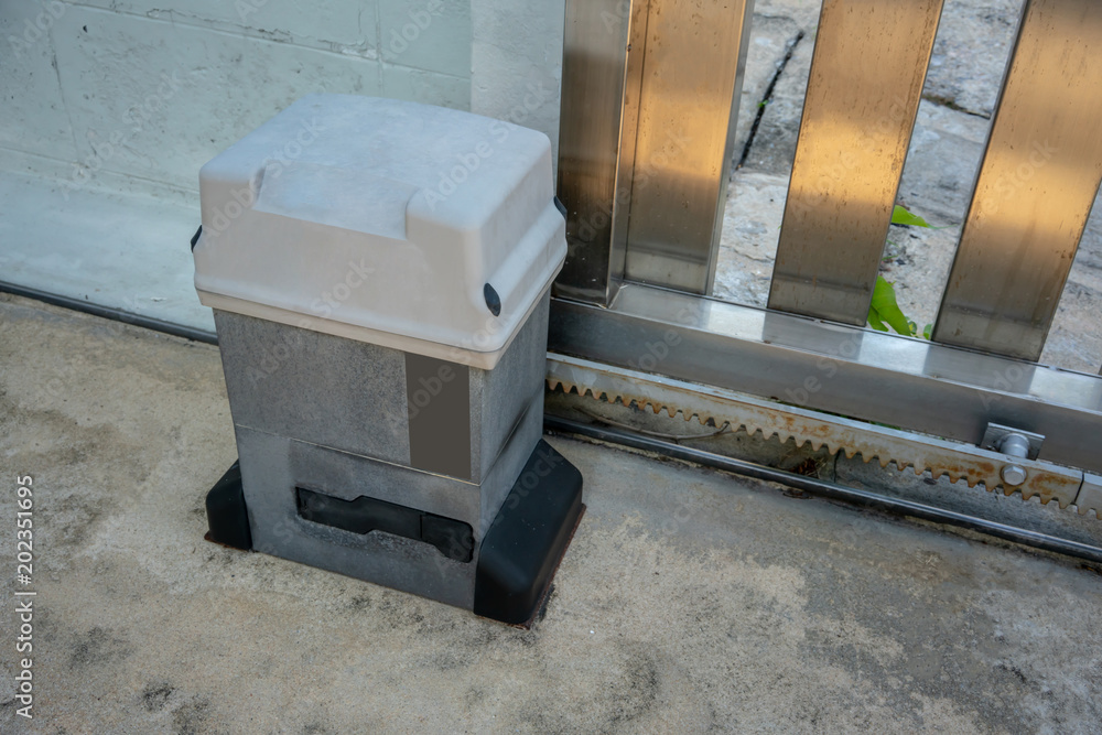 Parts of Sliding Gate system. Automatic doors and motor. Stock Photo ...