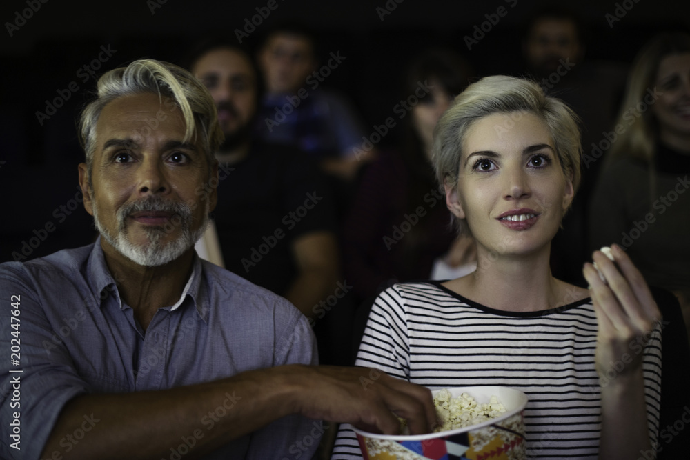 Couple watching movie together Stock Photo | Adobe Stock