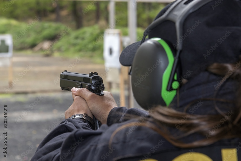 Shooting Police officers shoot from gun to target Stock Photo | Adobe Stock