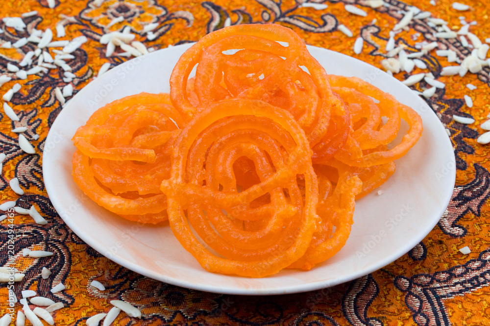 Jalebi, also Know as imarti, imarati, paneer jalebi or zulbia is a ...