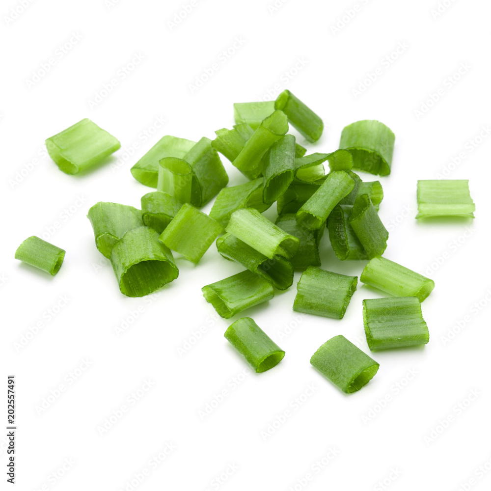 chopped spring onion or scallion isolated on white background cutout ...