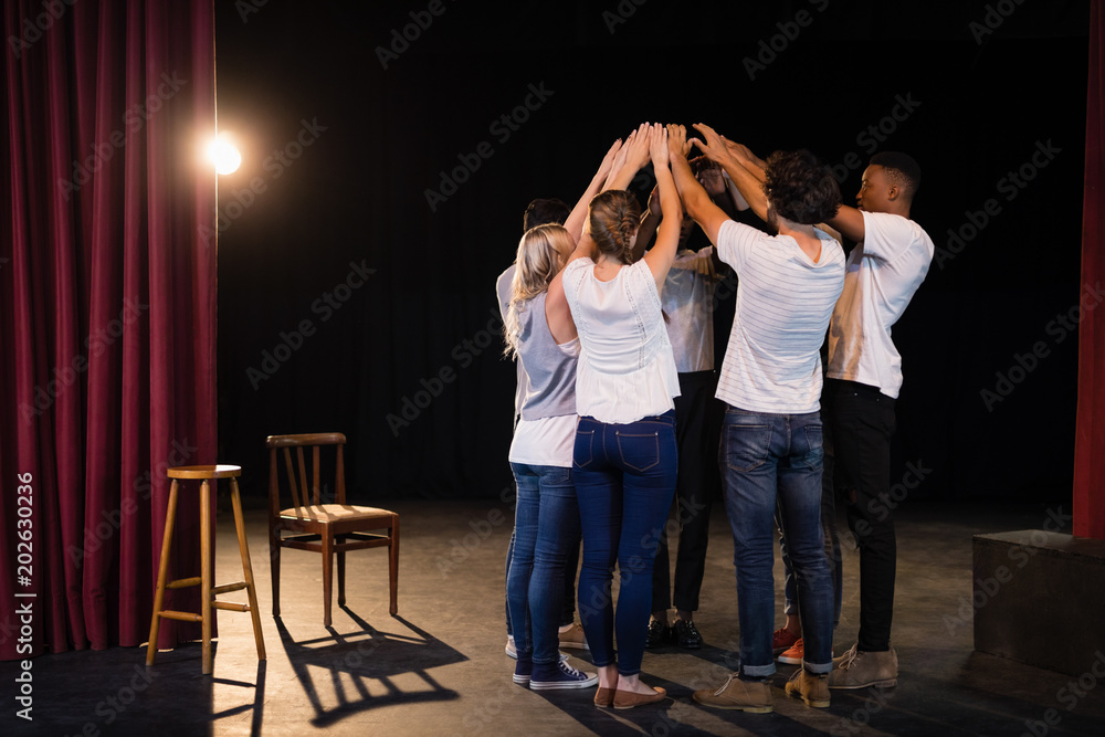 Actors team forming their hands stacked Stock-Foto | Adobe Stock