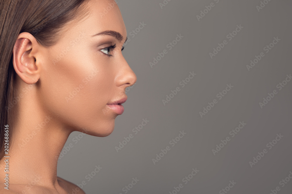 Side view profile of well groomed girl having ideal derma. Copy space ...