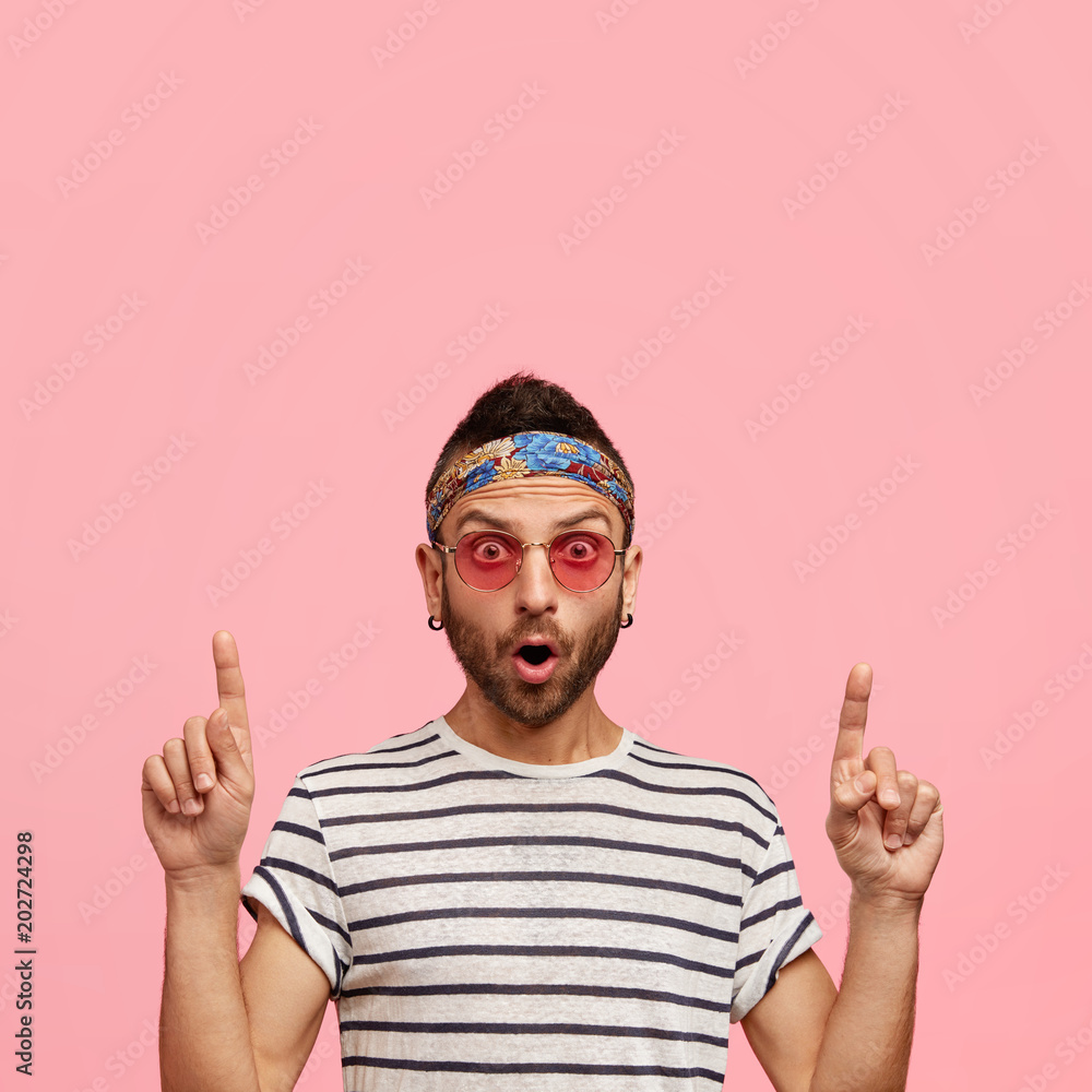 Youth movement and hippie subculture. Shocked attractive hippy male in ...