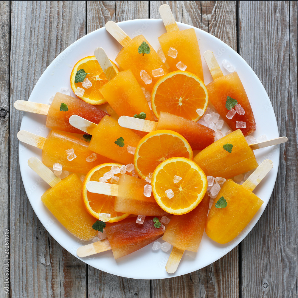 Orange ice pops Stock Photo | Adobe Stock