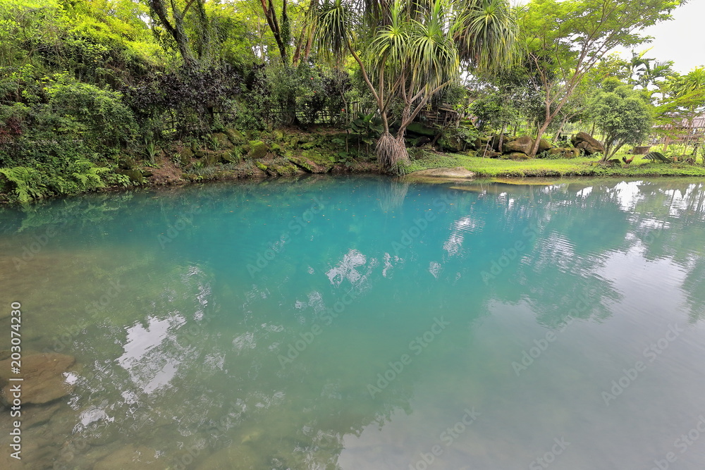 Blue waters of Malinab lagoon in Cabadiangan barangay. Sipalay ...
