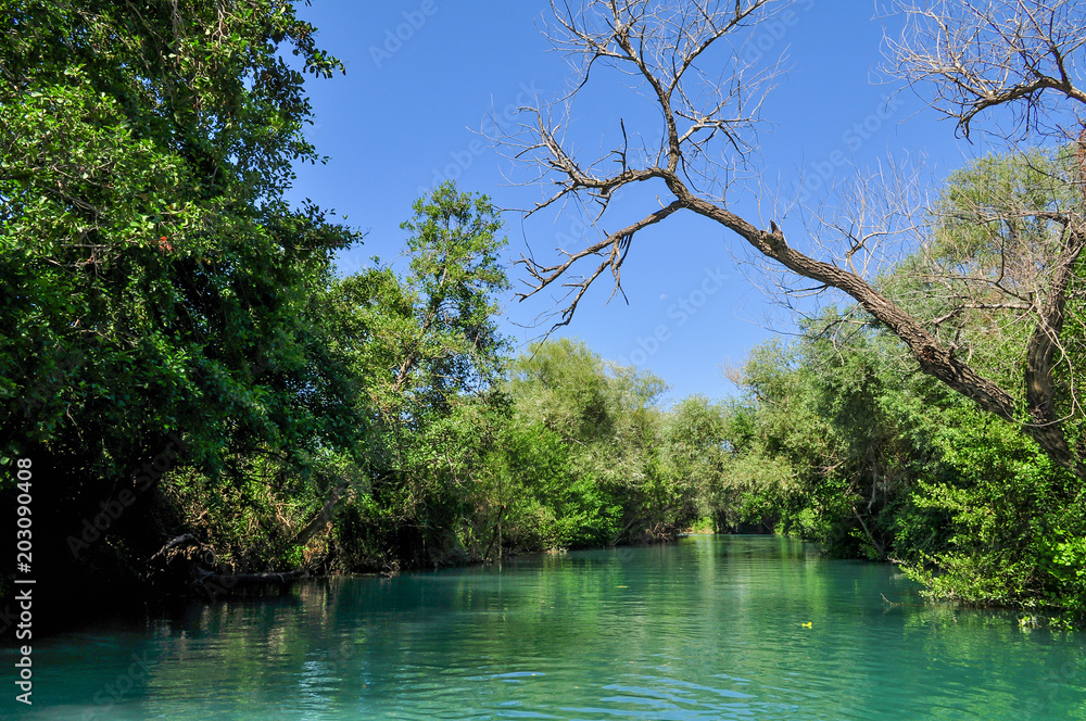 Crossing the Acheron river on board a small boat, near Parga, Epirus ...