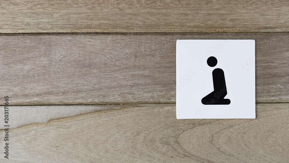 Islamic men prayer sign on wood wall with space on the left for adding ...