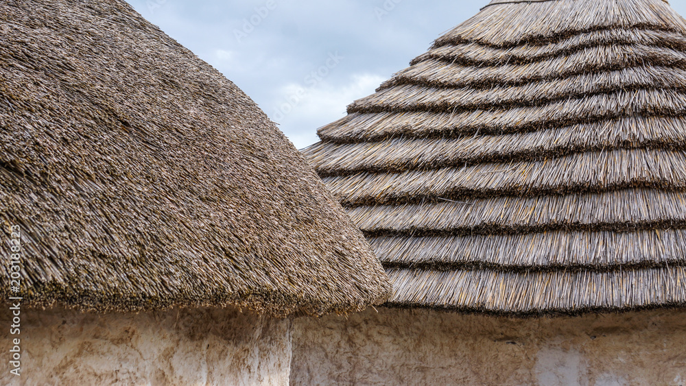 Neolithic huts near Stonehenge, the Cotswolds, England Stock Photo ...