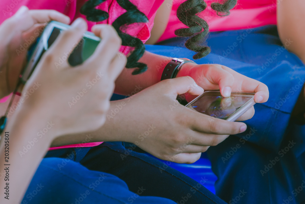 Students play games with mobile phones during their free time. Stock ...