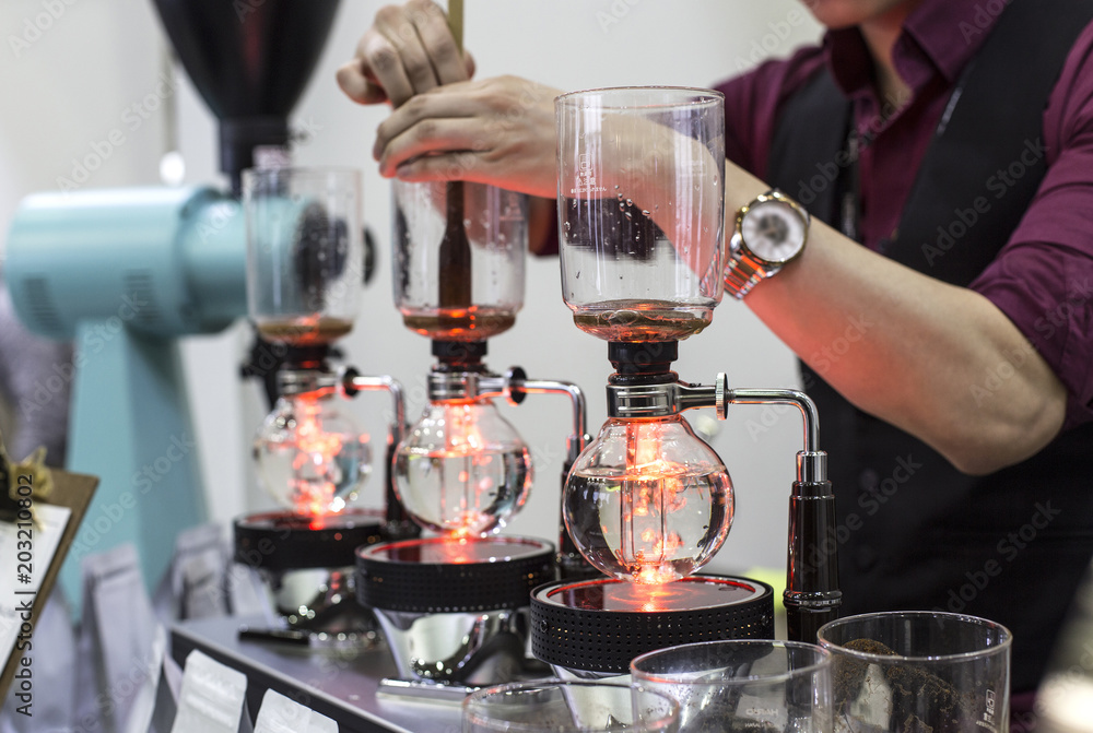 coffee preparation step by step. extraction process. Barista is pouring ...