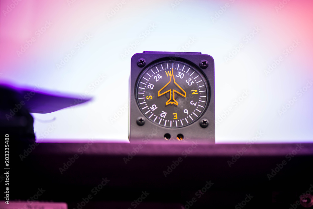 Macro shot of compass. Aircraft equipment, various indicators, buttons ...