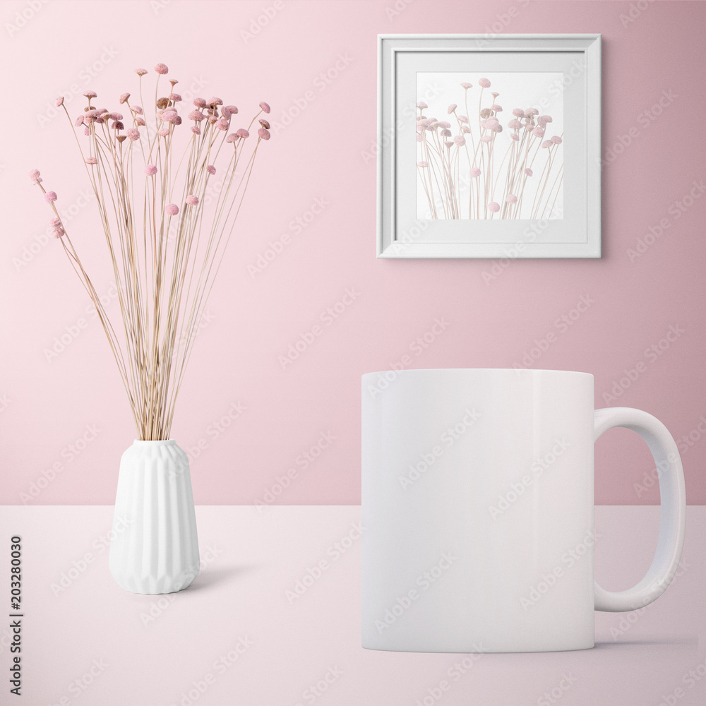 Pretty Mug Mockup set against a pink background with a vase of flowers ...