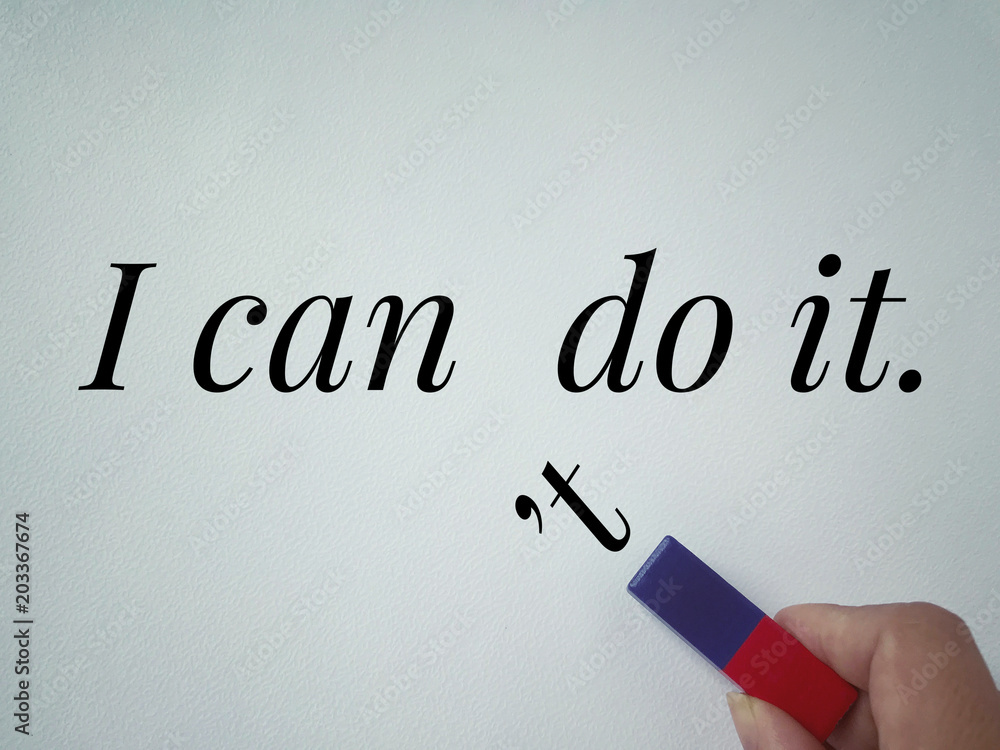 Conceptual - ‘I can do it’ written on a white paper with a letter ‘t ...