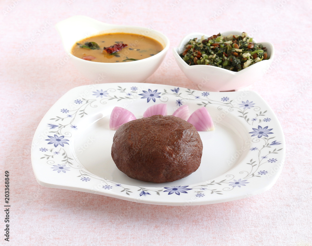 Ragi or finger millet ball, which is a healthy south Indian food, in a ...