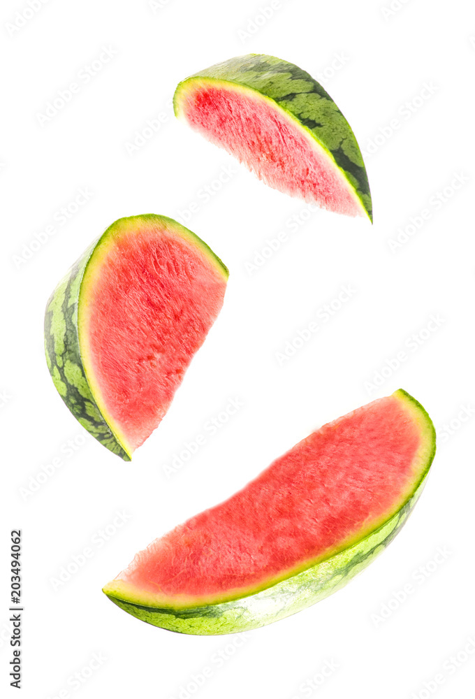big slices of flying watermelon isolated on white background. cut ...