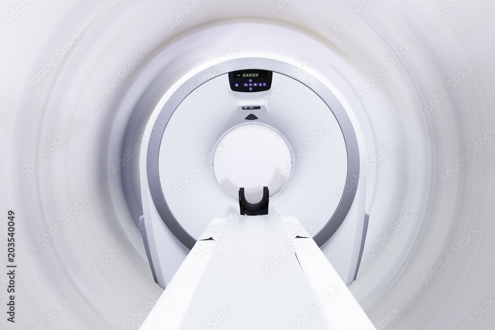 CT SCAN ( Computed Tomography ) on isolated radial blur background ...