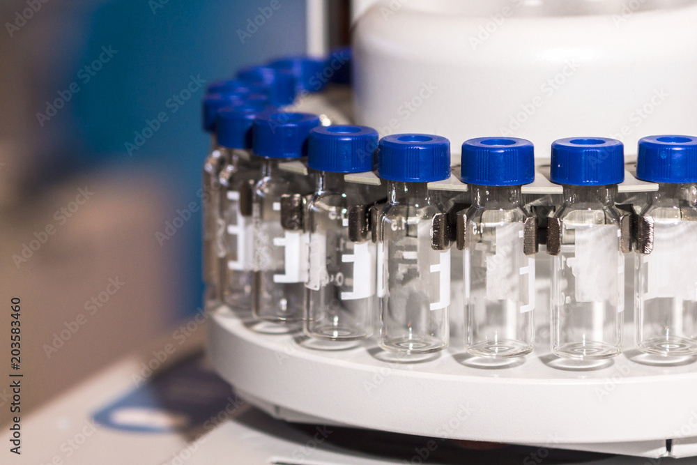 Glass vials for liquid samples. Laboratory equipment for dispensing ...