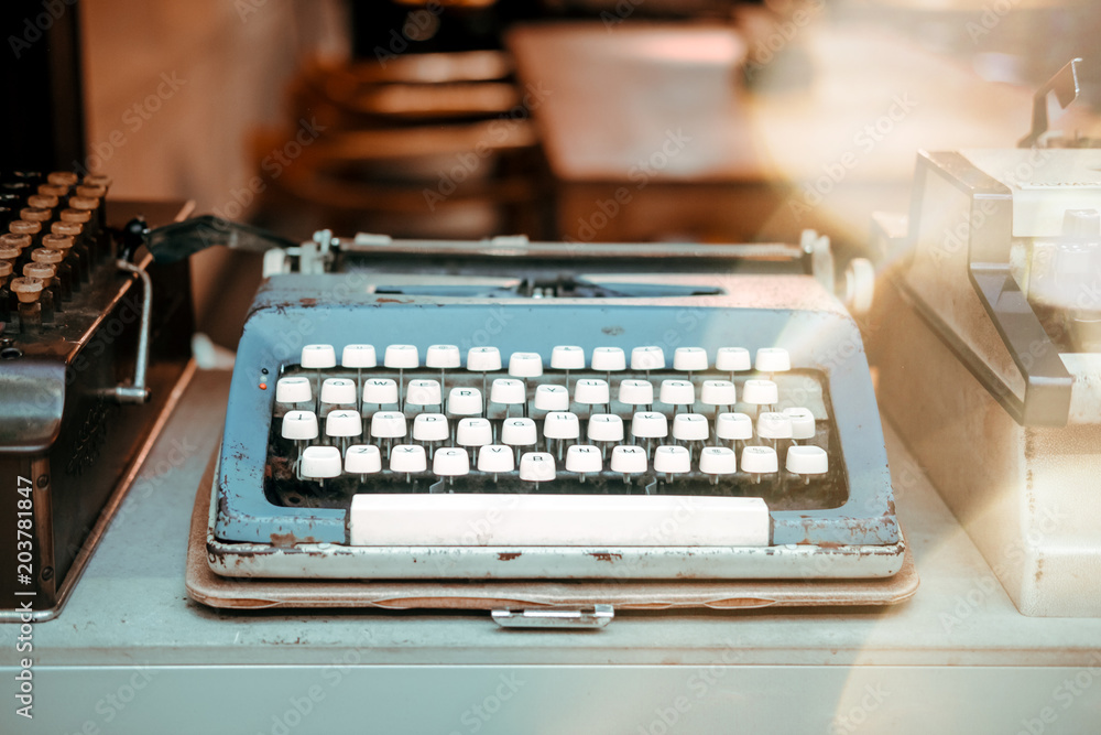 Old fashioned, retro typewriter close up photo. Sun flares filter ...
