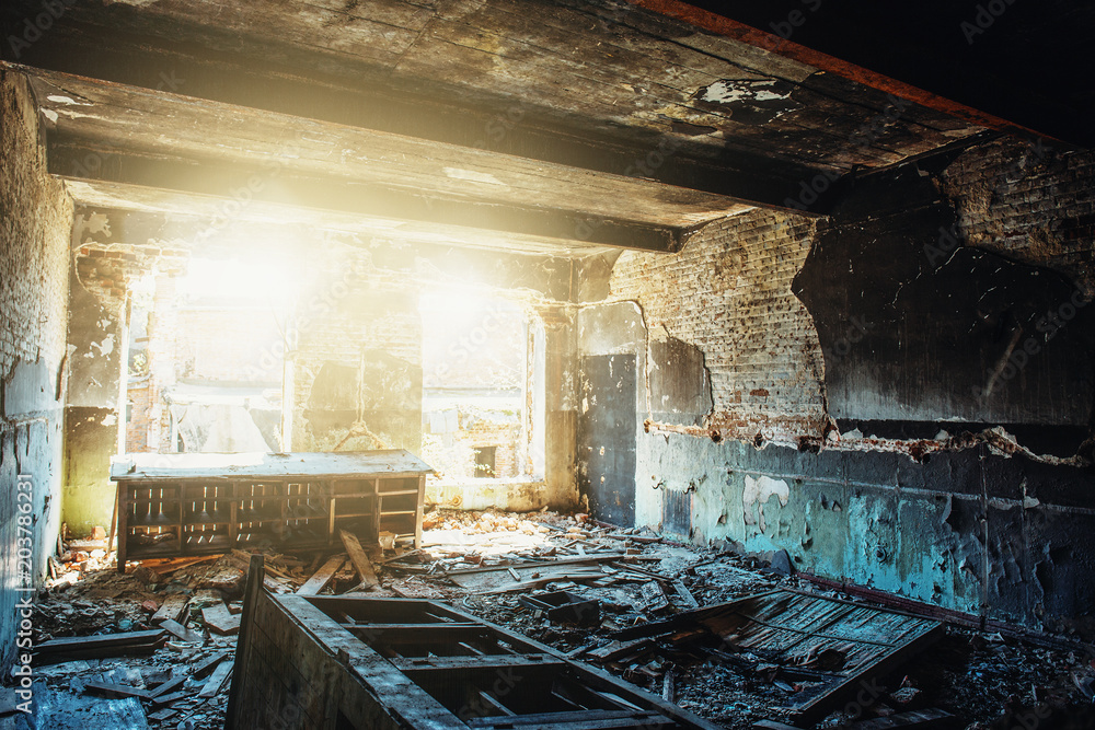 Ruins of old abandoned building, damaged in war, inside destroyed room ...