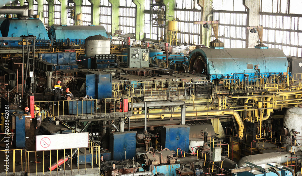 Power station. Machine room in thermal power plant with electric ...