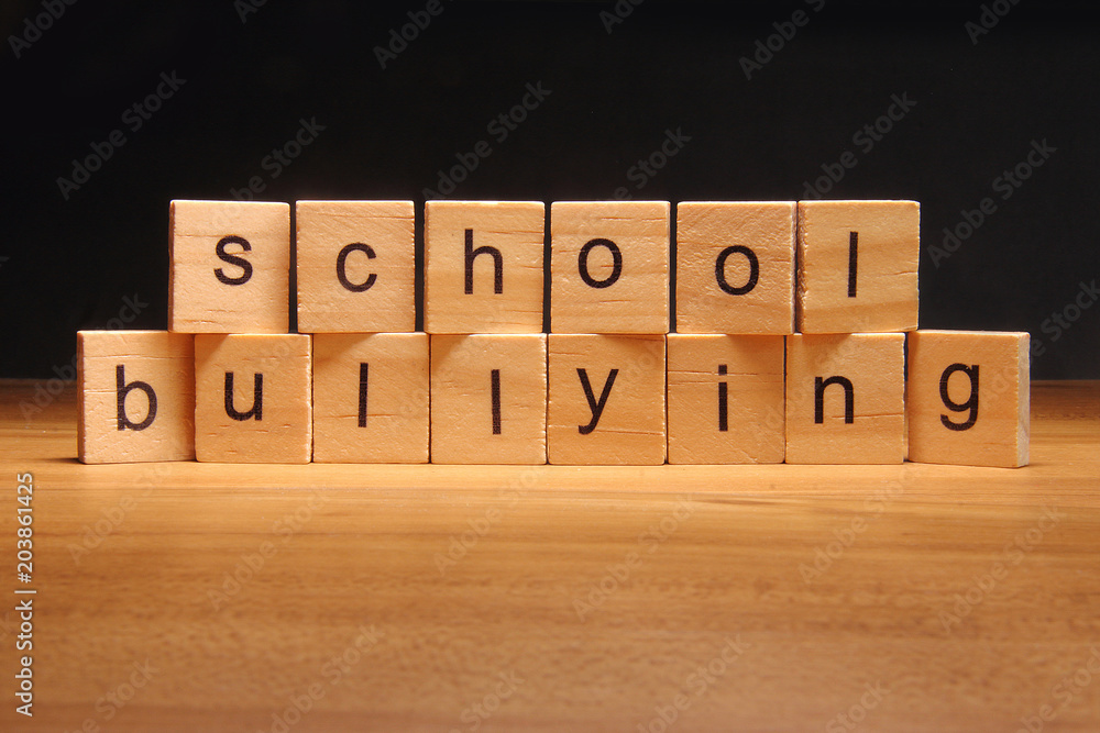 School bullying words written on wood cube Stock Photo | Adobe Stock