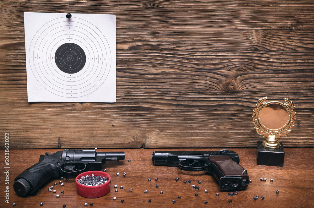 Best shooter award background with copy space. Winner in shooting. Gun ...