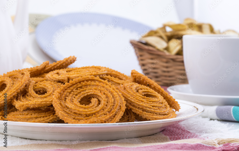 Indian Traditional Snack Chakli, a spiral shaped crisp deep fried snack ...