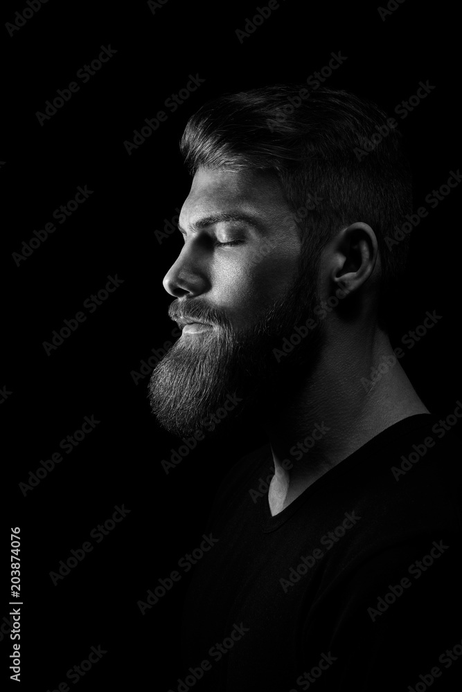 Calm peaceful atmosphere. Relaxed attractive male model meditates and ...