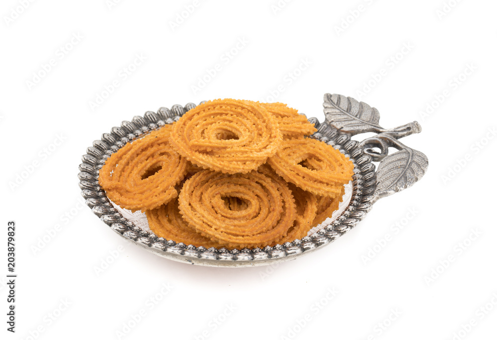 Indian Traditional Snack Chakli, a spiral shaped crisp deep fried snack ...